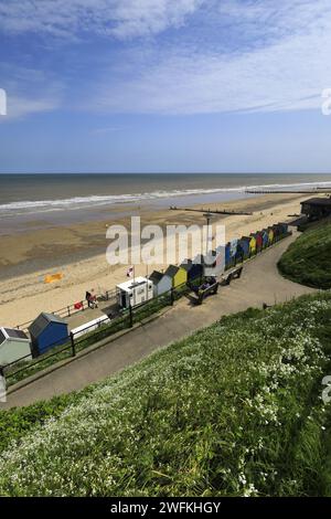 Beach huts and the beach at Mundesley village, North Norfolk, England ...