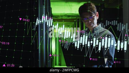 Image of data processing over asian man checking servers Stock Photo ...