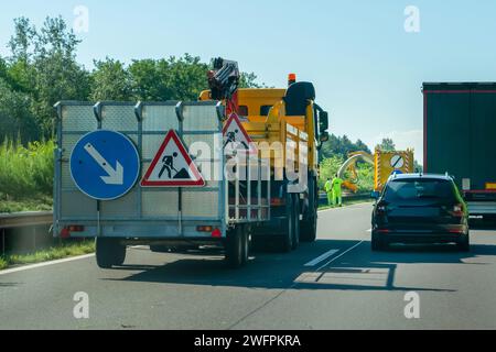 Highway Maintenance sign on back of van, UK Stock Photo - Alamy