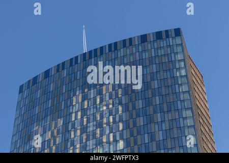 The Blade residential tower with a plane flying over Manchester. Part ...