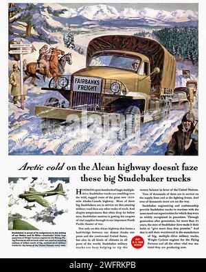 Trucks make their way through a snowy landscape on motorway A22 ...