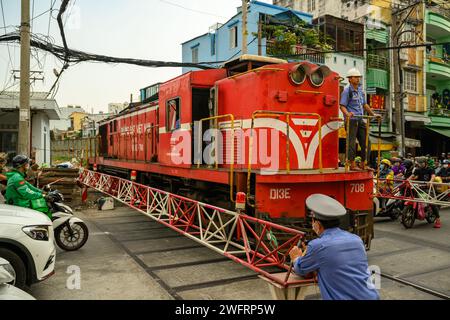 A Vietnamese shunting train crossing a Level Crossing in Ho Chi Minh ...