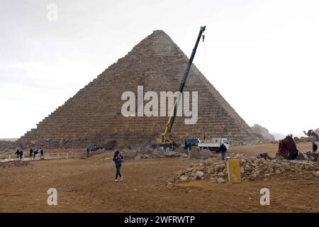 Giza, Egypt. 31st Jan, 2024. Collapsed stones are seen in front of the ...