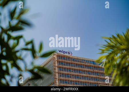 Wipro logo is shown at the top of their building. Wipro Ltd. is a ...
