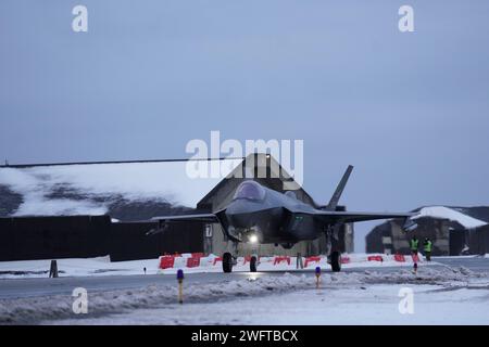 A Norwegian F-35 fighter plane in place in a hangar at Keflavik in ...