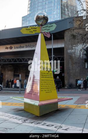 Tooley Street Triangle, street art and large signpost at London Bridge ...
