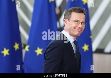 Sweden's Prime Minister Ulf Kristersson arrives for an EU Summit at the ...