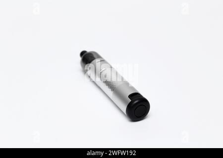 Vaping device, vape, pod, kit silver color on black and white ...