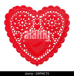 Red paper heart on top of wooden cross crucifix. Isolated on white ...