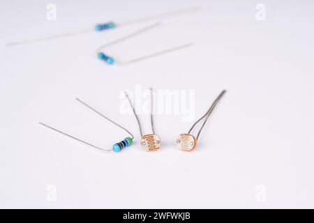 Electronic parts photoresistor on white background Stock Photo - Alamy