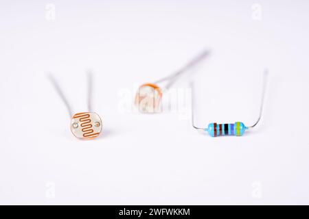 Electronic parts photoresistor on white background Stock Photo - Alamy