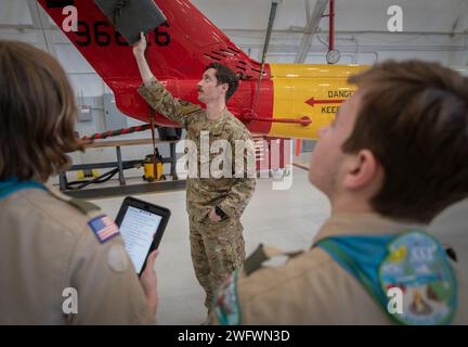 Niceville Scouts BSA Troop 553, gather around the UH-1N Huey helicopter ...