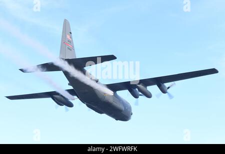 A 910th Airlift Wing aerial spray modified C-130H Hercules sprays water ...