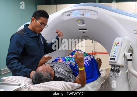 Corpsman 3rd Class Johndenzel Macatuno, from Dededo, Guam, prepares a ...