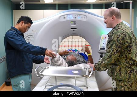 Corpsman 3rd Class Johndenzel Macatuno, from Dededo, Guam, prepares a ...