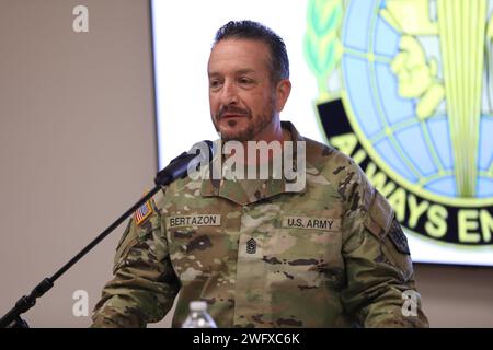 Command Sgt. Maj. Edward Bailey stands at attention during a change of ...