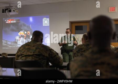 Sean McGoffin, chief border patrol agent, gives a brief to the ...