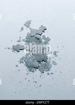 Silver chloride (AgCl) darkened from light, the product of the reaction ...