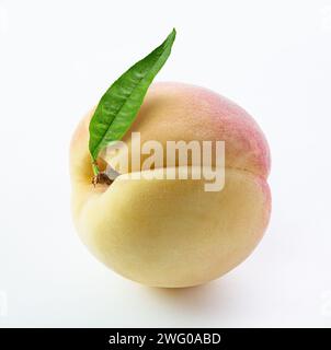 three peach fruits with leaf isolated on white background Stock Photo ...