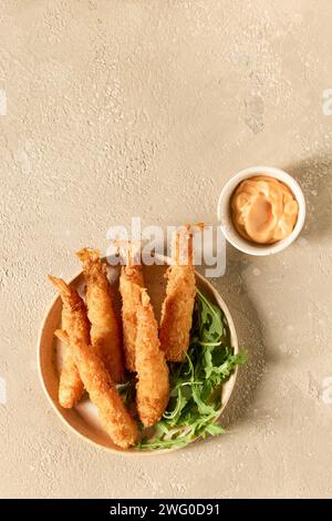 plate of breaded Torpedo shrimps and sweet chili sauce isolated on ...