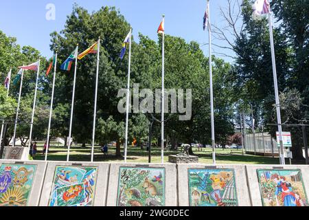 Cooma town centre with avenue of flags and timeline of mosaics at ...