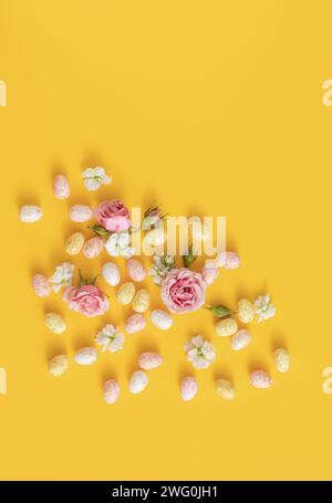 Easter flower arrangement with colorful speckled eggs daisy flowers and ...