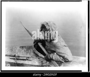 The seal-hunter, Noatak, in kayak, facing left, c1929 Stock Photo - Alamy