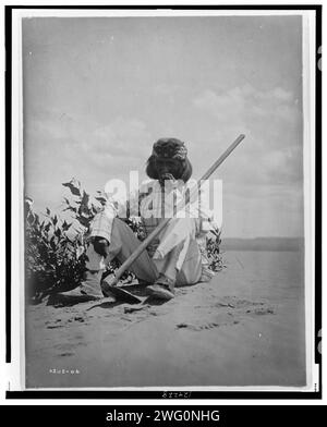 A quiet smoke-Hopi, c1907. Hopi man sitting on ground smoking, with hoe ...