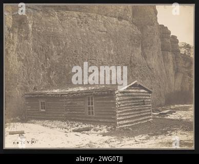 Camp Curtis, 1908. Photograph shows log cabin in clearing in front of a ...