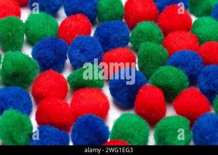 small fluffy balls isolated on white background Stock Photo - Alamy