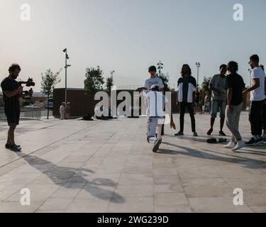 A street dance troop can be seen film a dance video near Tigne Point in ...