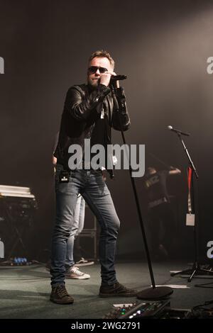 Rock star performing live show playing guitar, feeling heavy metal ...