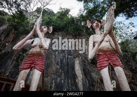 Large statues depicting hell at the Wat Tham Pla Temple. Wat Tham Pla ...