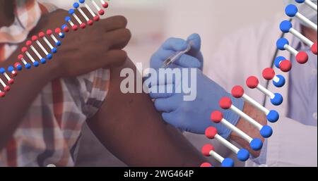Image of dna strands over african american female doctor pushing girl ...