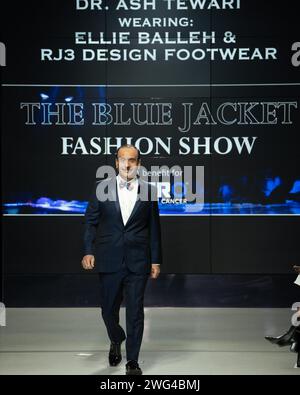 Dr. Ash Tewari walks the runway wearing Huntsman during the Seventh ...