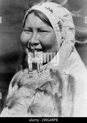 Eskimo women wearing clothing made from eider duck skins. Frank and ...