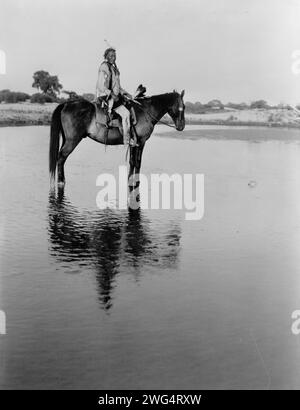 The lone Chief-Cheyenne, c1927. Cheyenne man on horseback in shallow ...