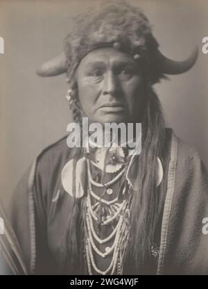 White Man Runs Him, 1908. Photograph shows head-and-shoulders portrait ...