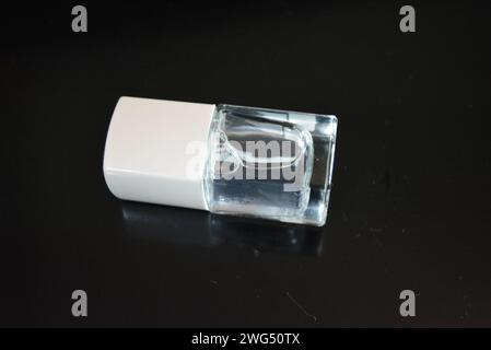 Female nail polish with a white lid for nail strengthening is located ...