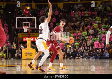 Stanford forward Maxime Raynaud looks up while standing on the court ...