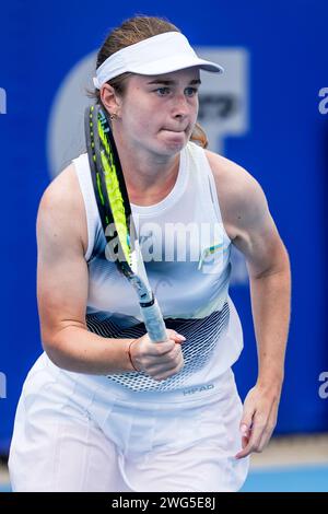 Daria Snigur of Ukraine in action during her round 1match against ...