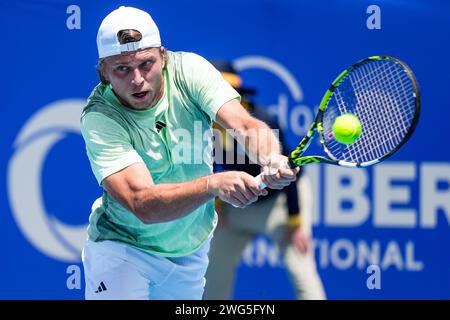 Alexandre Muller of France in action against David Goffin of Belgium ...