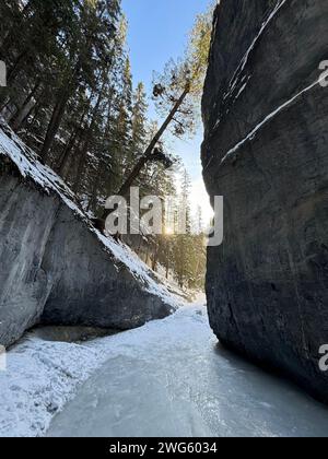 Grotto Canyon in winter with the walkpath frozen in Canmore, Alberta ...