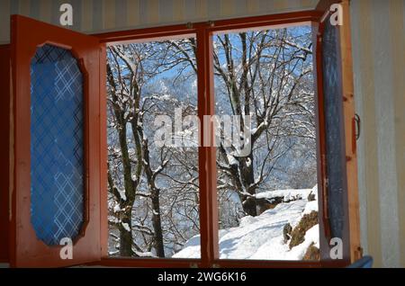 Window outside snowfalls beautiful scene Stock Photo - Alamy