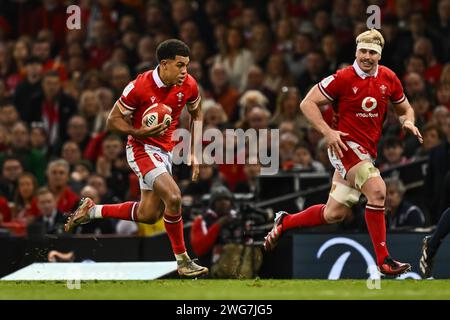 Rio Dyer of Wales makes a break during the 2024 Guinness 6 Nations ...