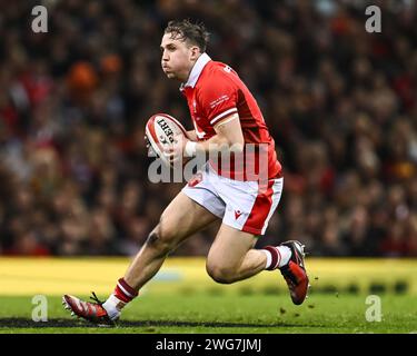 Ioan Lloyd of Wales makes a break during the 2024 Guinness 6 Nations match Wales vs Scotland at ...