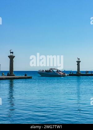 Mandraki port with deers statue, where The Colossus was standing and ...