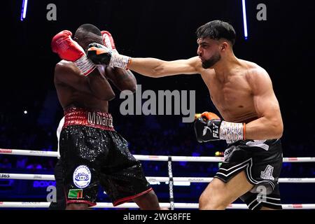 Adam Azim (right) in action against Enock Poulsen in the Euro Super ...