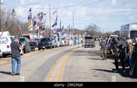 Quemado, Texas, USA. 3rd Feb, 2024. Convoy participants sharing their ...