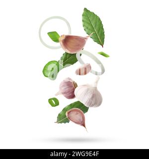 Different aromatic spices falling on white background Stock Photo - Alamy